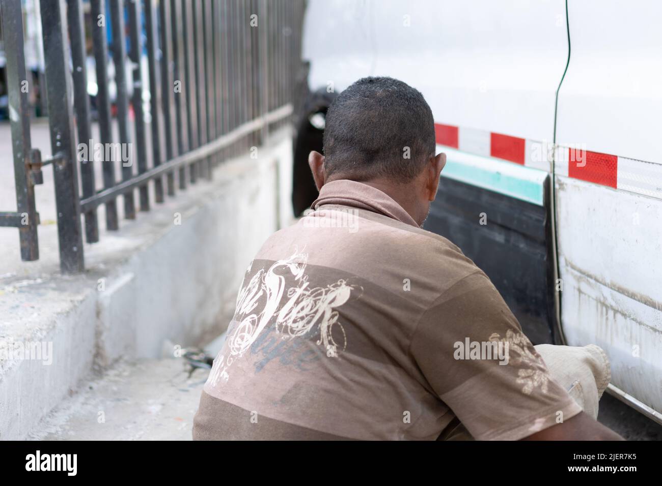 African Mechanic Working On Car In Garage Stock Photo - Alamy