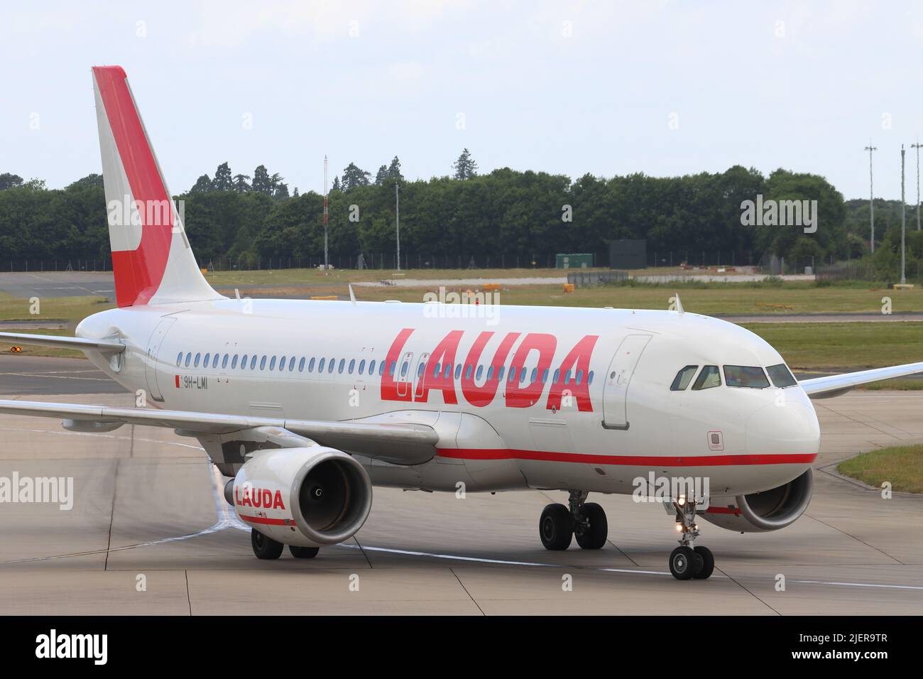 Lauda Air, Airbus A320 9H-LMI, arriving at Stansted Airport, Essex, UK ...