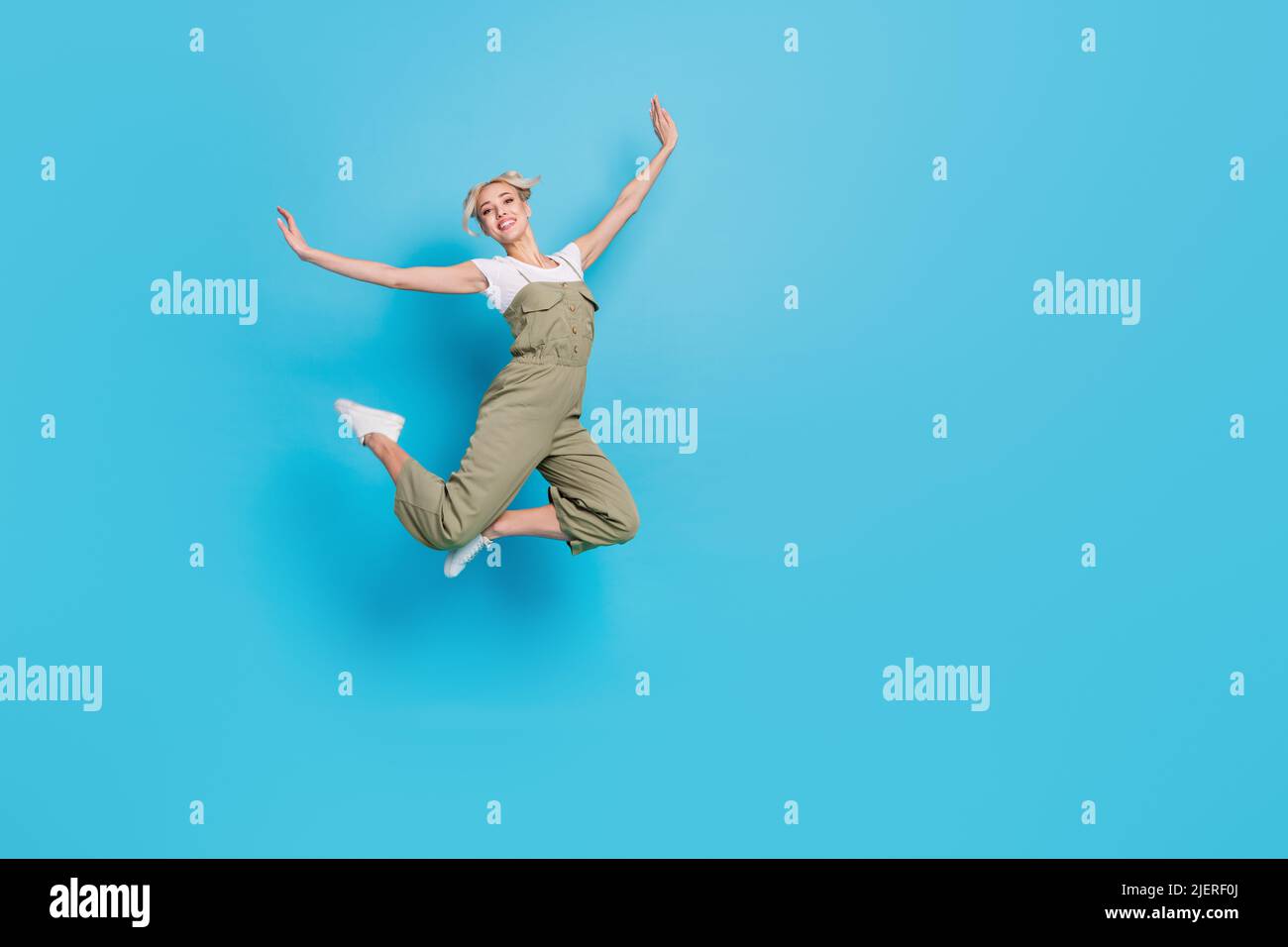 Full body photo of cute millennial lady jump wear t-shirt grey overall ...