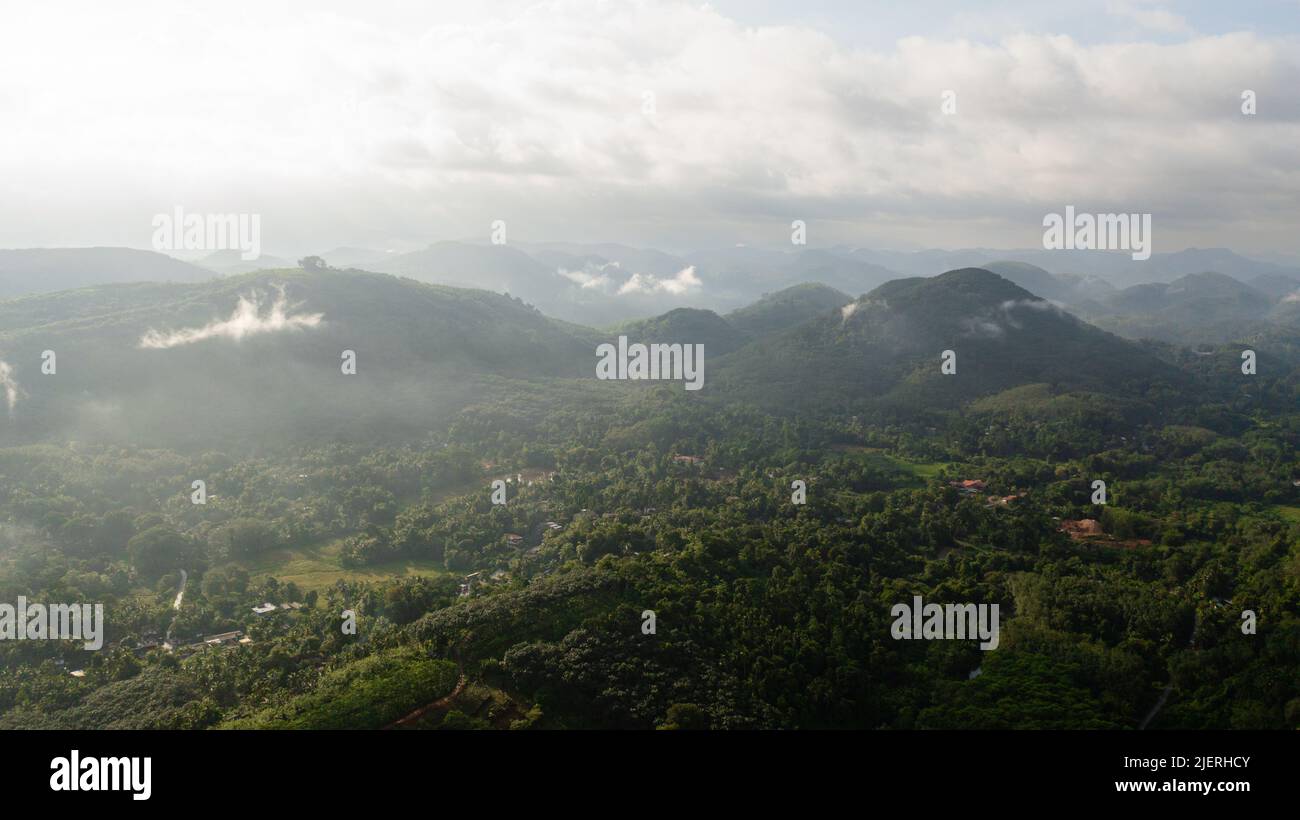 Mountain slopes covered with rainforest and jungle View from above.Sri ...