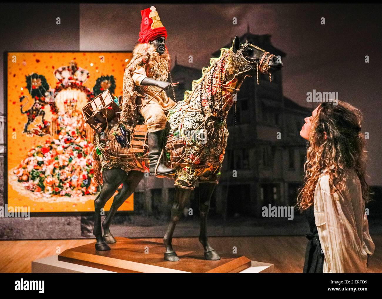 London, UK. 28th June, 2022. Gallery staff in the Hew Locke room with ...