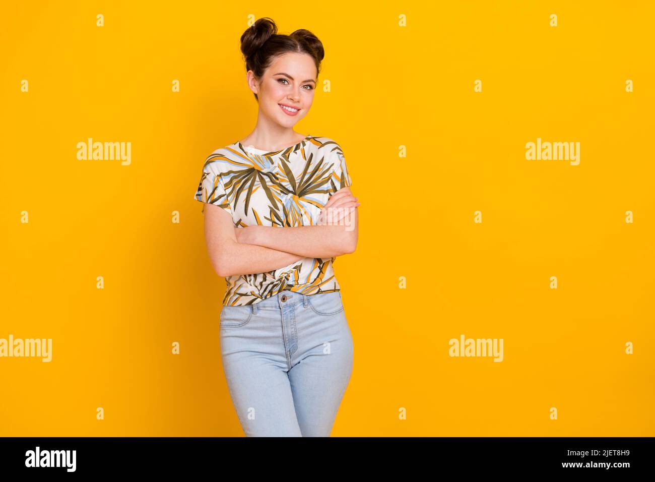 Photo of shiny pretty woman wear print t-shirt arms crossed empty space ...