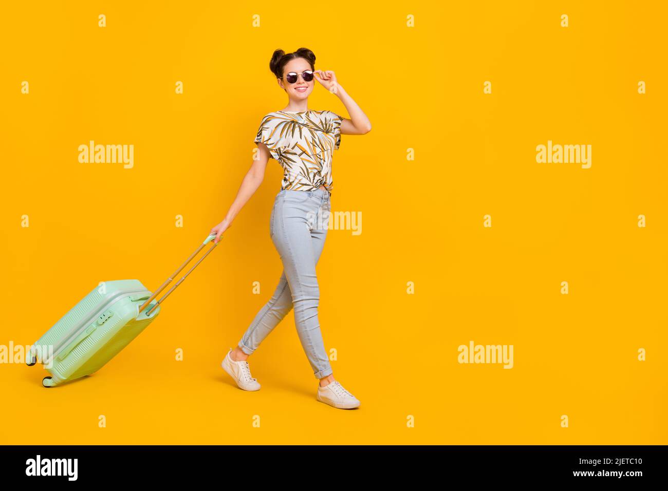 Photo of pretty cool woman wear print t-shirt arm dark spectacles going ...