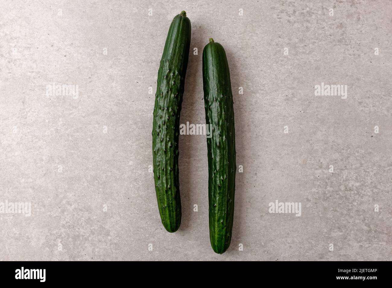 Long and succulent vegetable green cucumber Stock Photo - Alamy