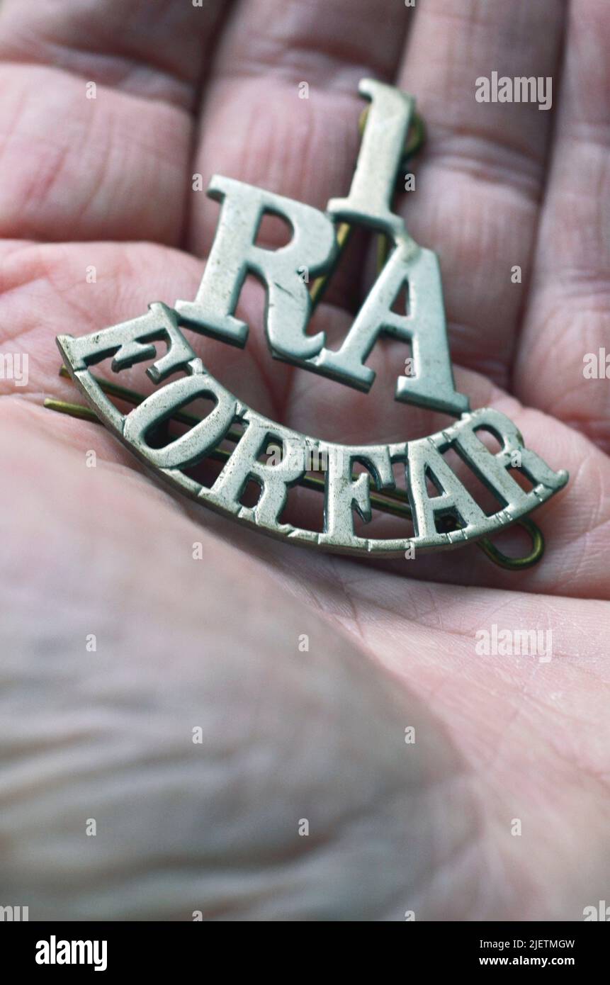 hand holding scottish military badge Stock Photo - Alamy