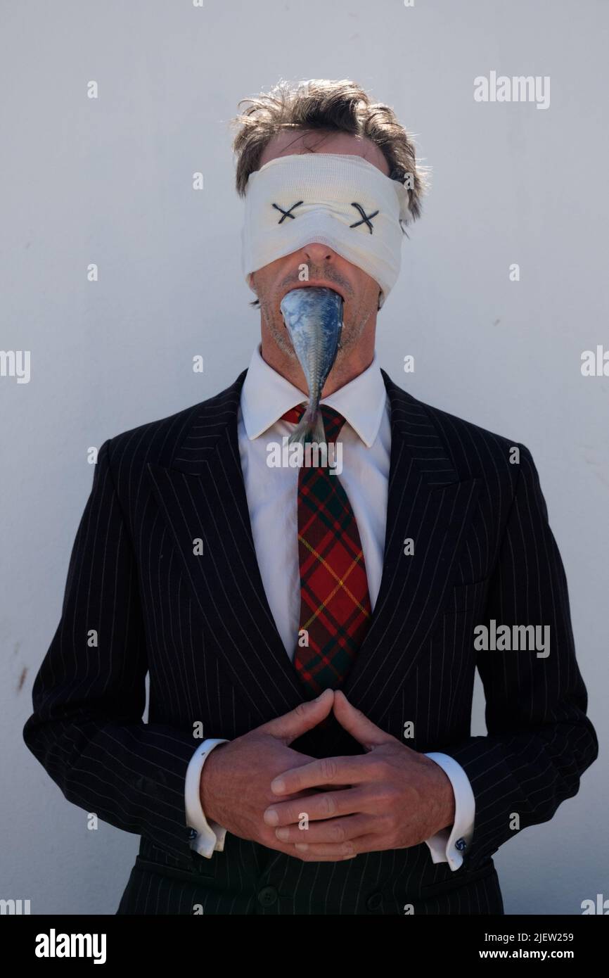Lisbon, Portugal. 28th JUN 2022. Three blind personas with bandaged ...