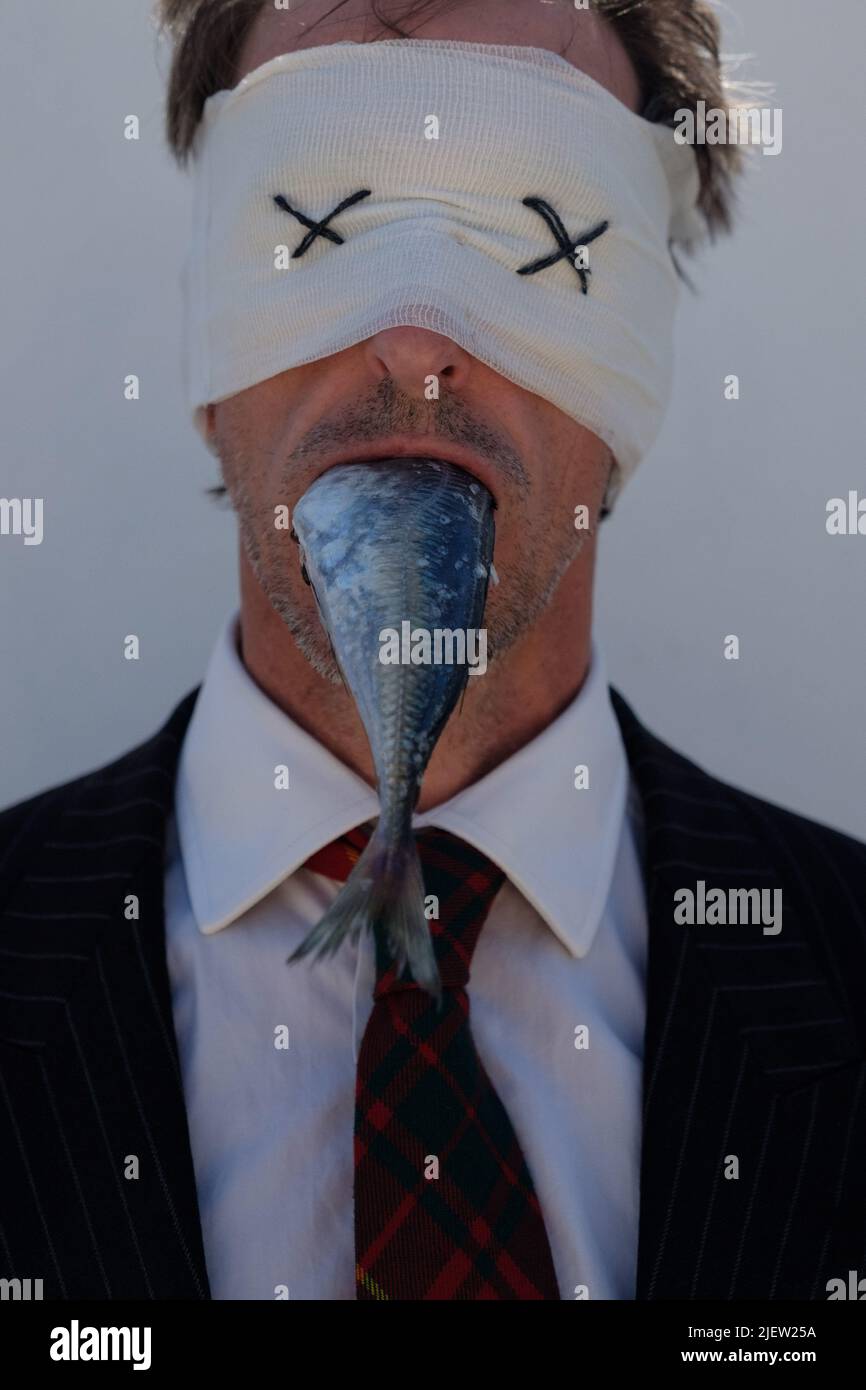 Lisbon, Portugal. 28th JUN 2022. Three blind personas with bandaged ...