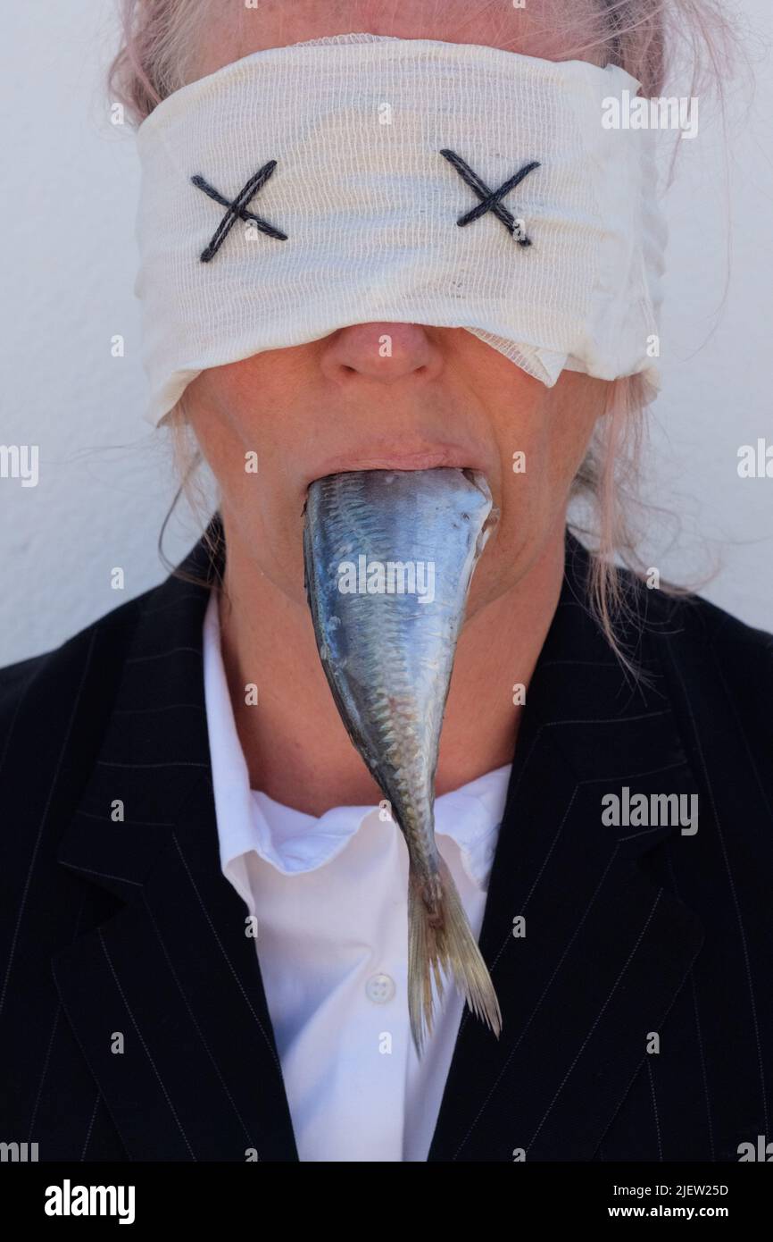 Lisbon, Portugal. 28th JUN 2022. Three blind personas with bandaged ...