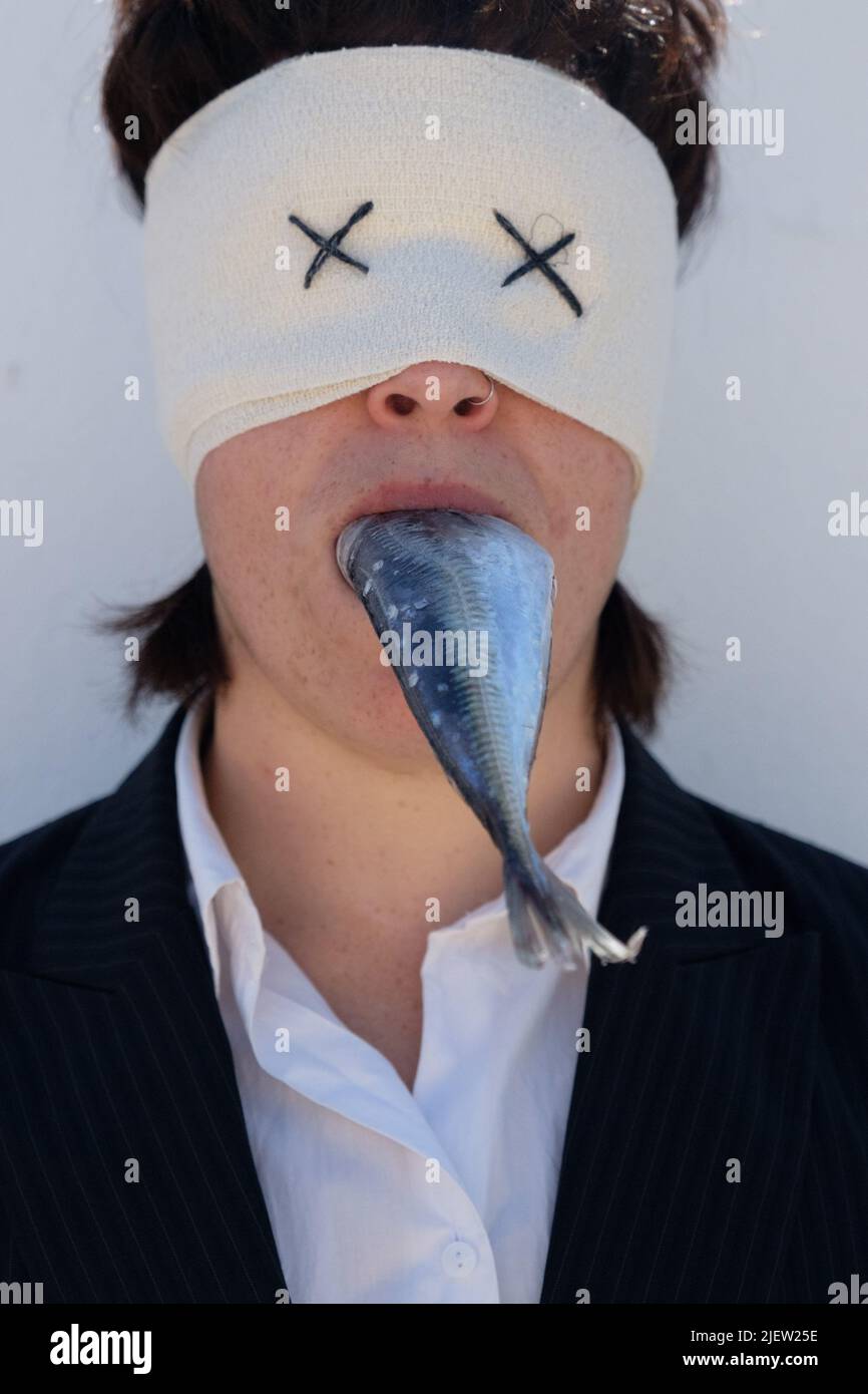 Lisbon, Portugal. 28th JUN 2022. Three blind personas with bandaged ...