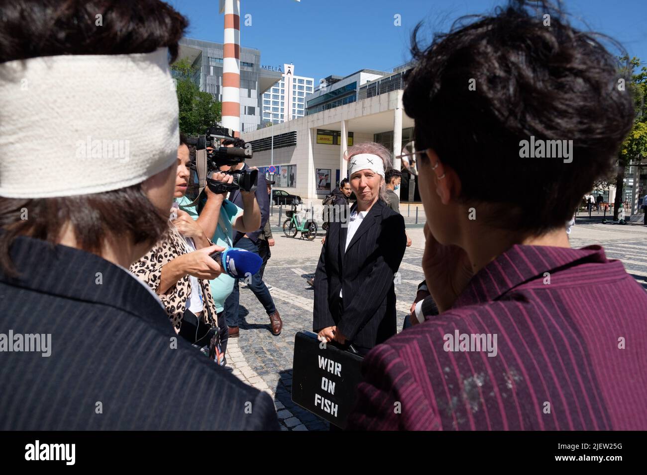 Lisbon, Portugal. 28th JUN 2022. Three blind personas with bandaged ...