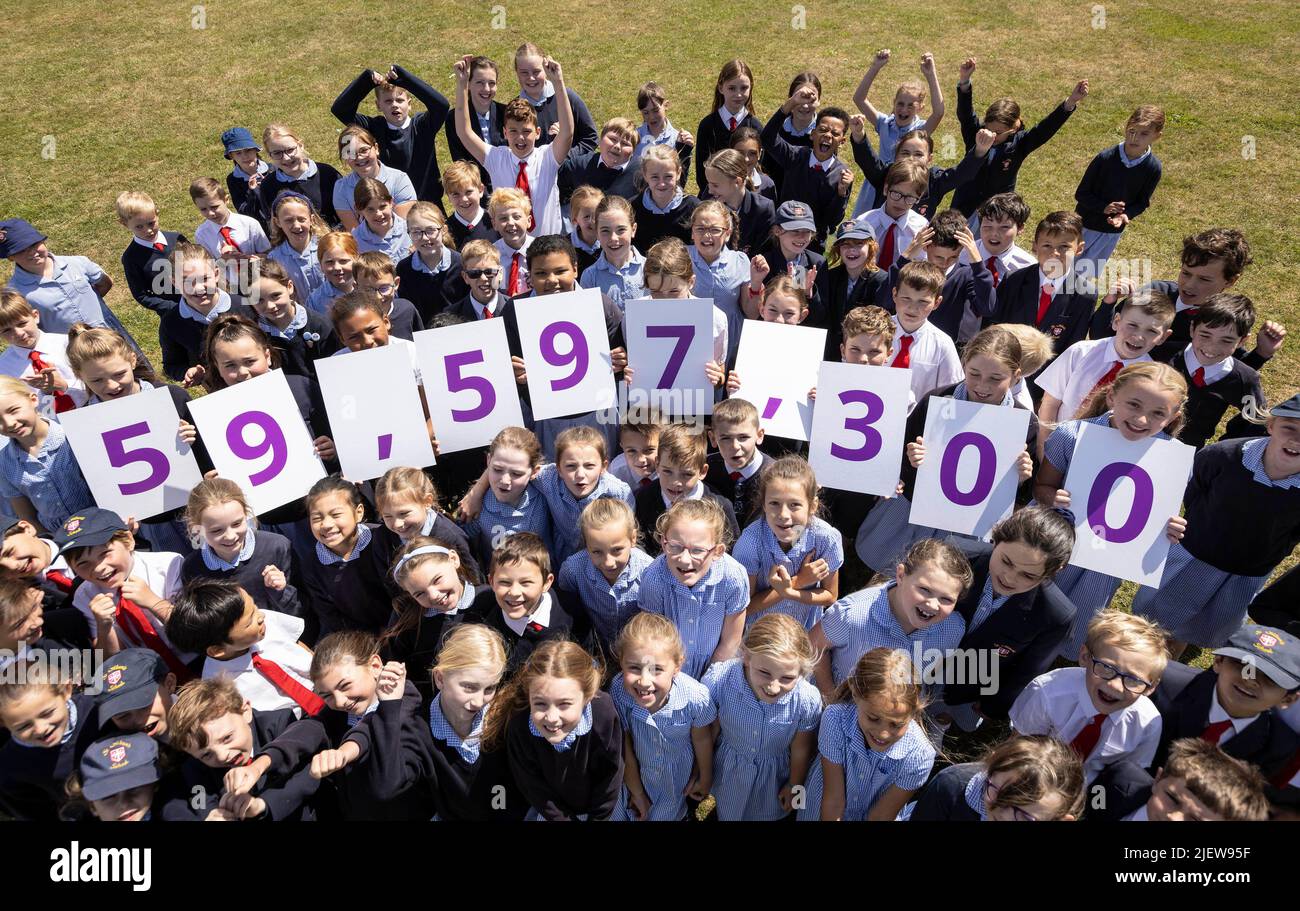 EDITORIAL USE ONLY Pupils from St Alban's Primary School in Havant hold ...