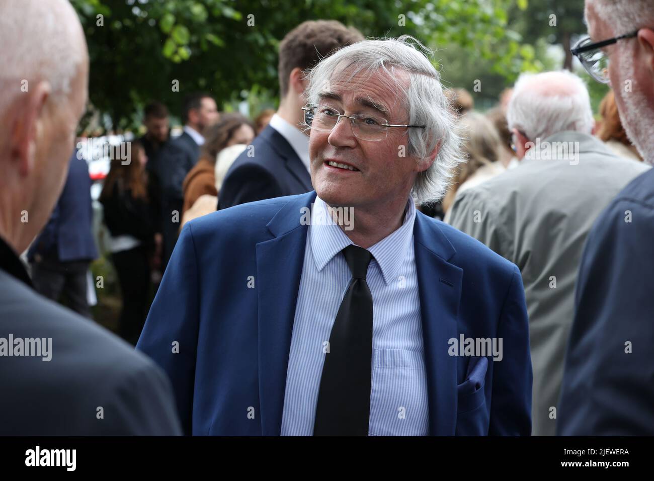 Eamon Phoenix at the funeral of long-time owner of the Irish News ...