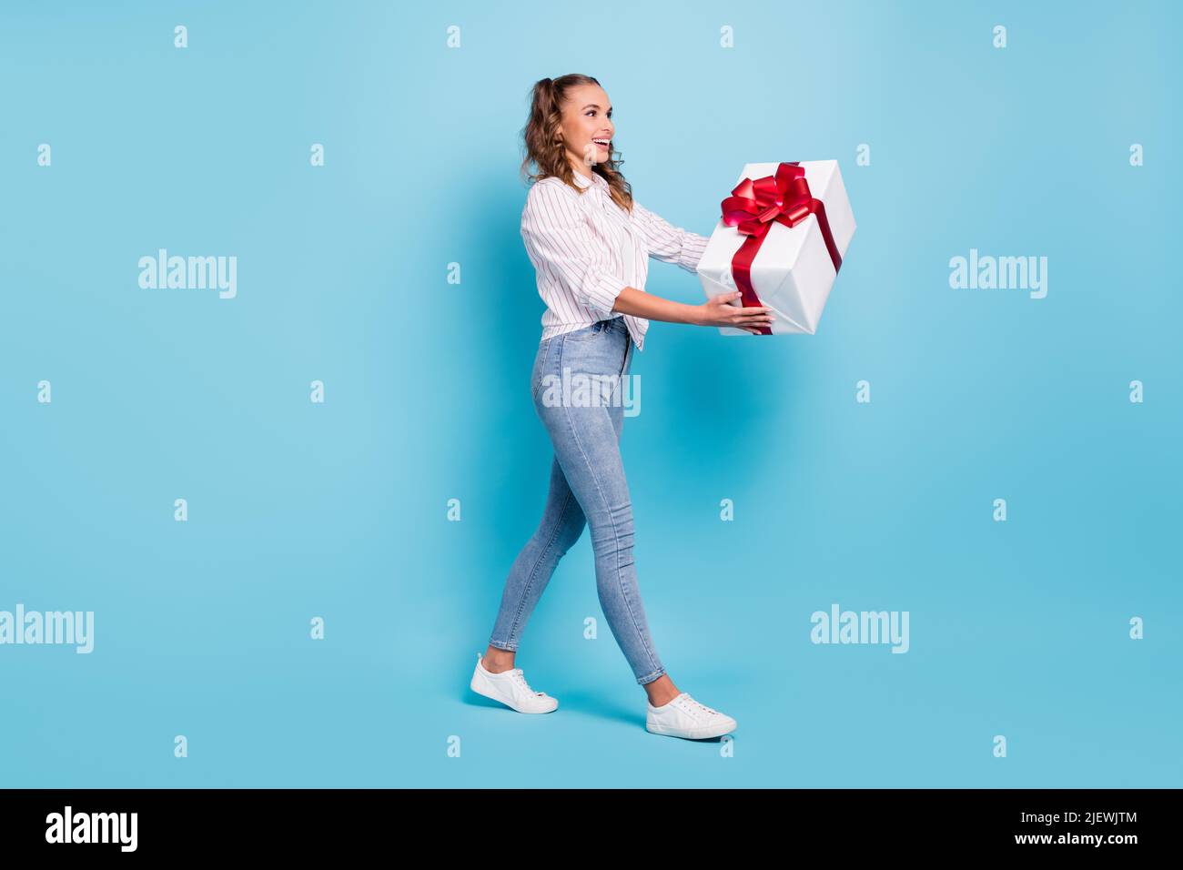 Full length body size photo of girl giving present smiling at party ...