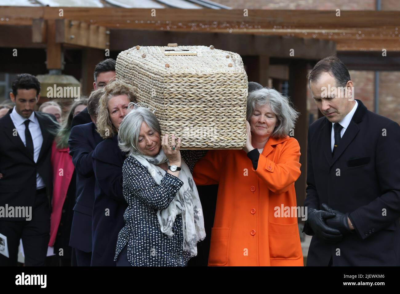 Mourners carry the coffin of James Fitzpatrick after the funeral of the ...