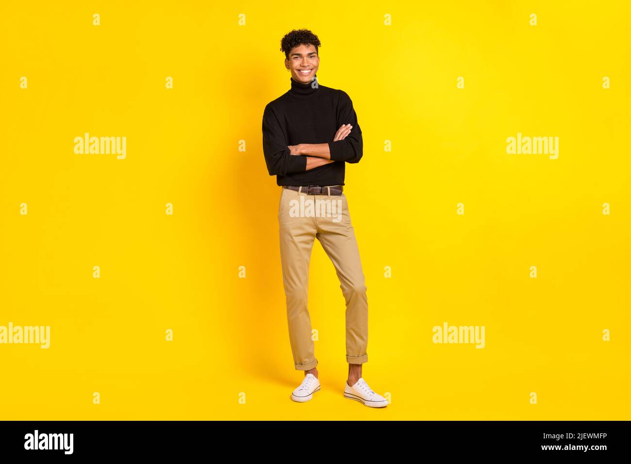 Full size photo of optimistic brunet guy stand crossed arms wear black ...