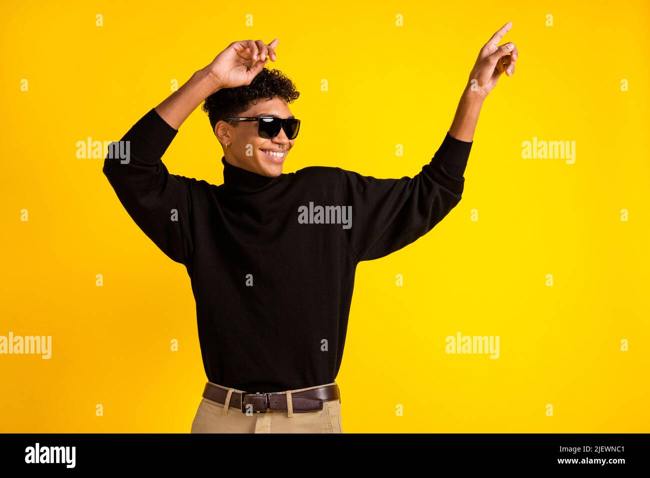 Photo of sweet cool dark skin man wear black jumper eyewear dancing ...