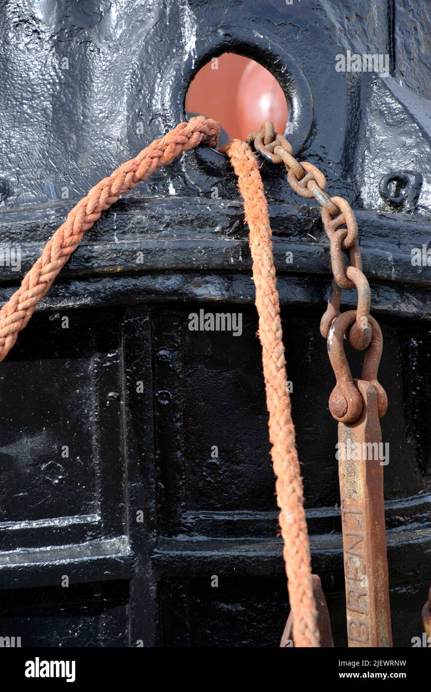 mooring rope and anchor on bow of steel barge maldon essex england ...