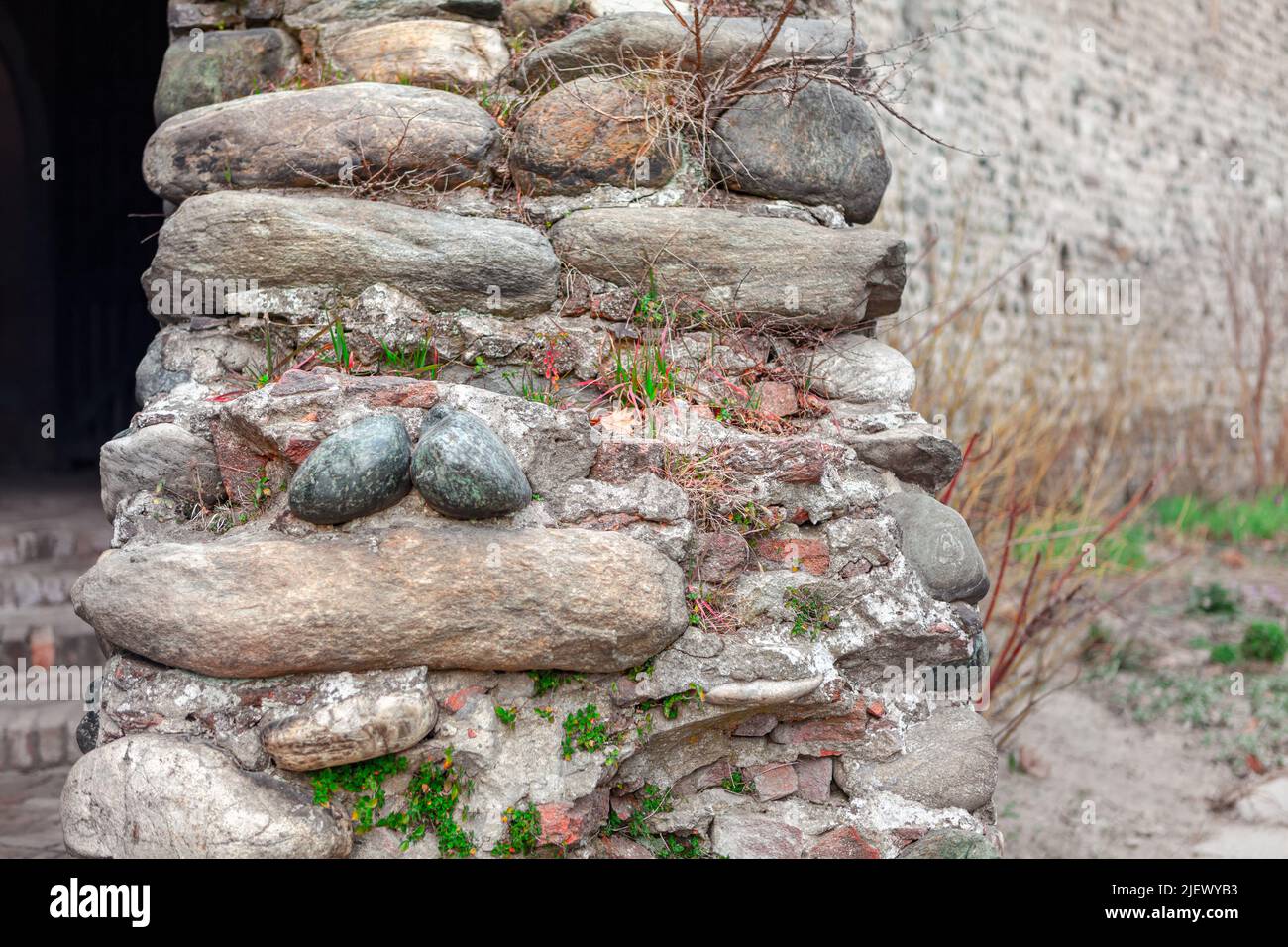 Stone wall of a medieval fortress . Ancient fort stones Stock Photo - Alamy