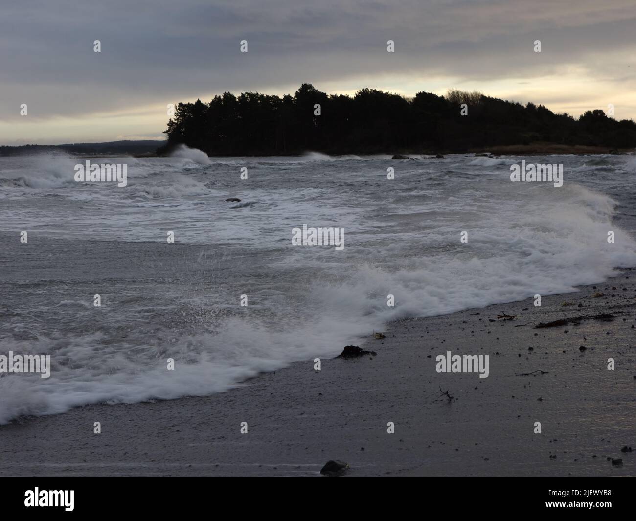 Strong waves, after the storm, which wash over the beach Stock Photo ...