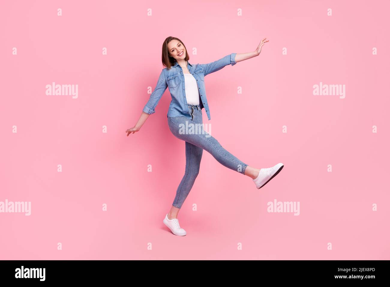 Full length body size photo girl smiling dancing wearing jeans outfit ...