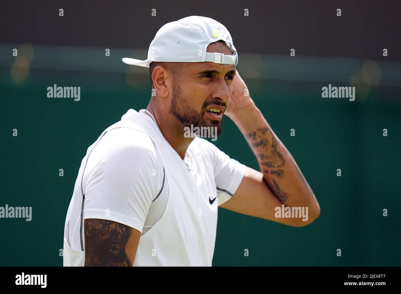 Nick Kyrgios during his match against Paul Jubb on day two of the 2022 Wimbledon Championships ...