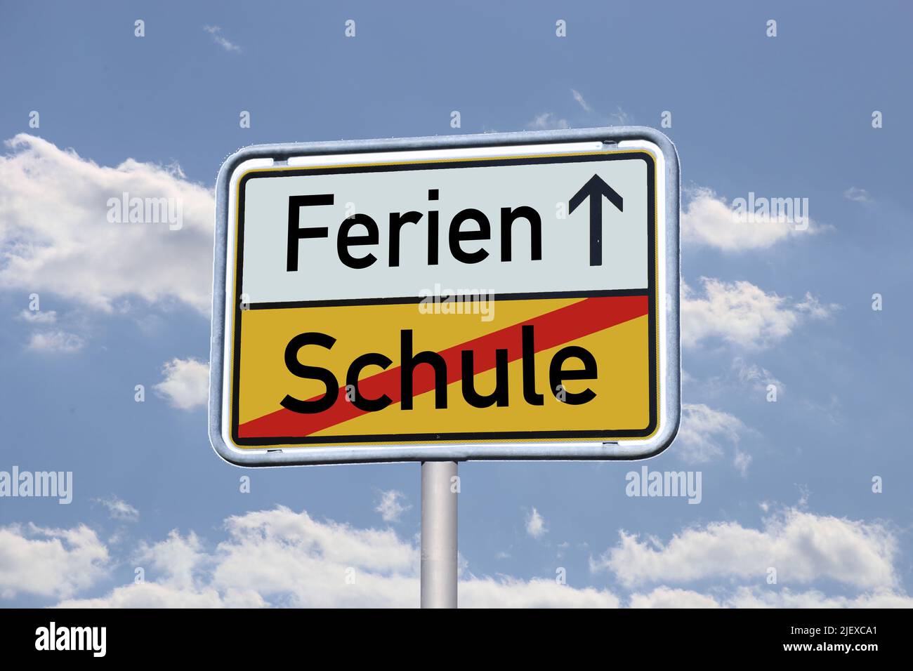 Symbol image: German town exit sign with the words Schule/Ferien ...