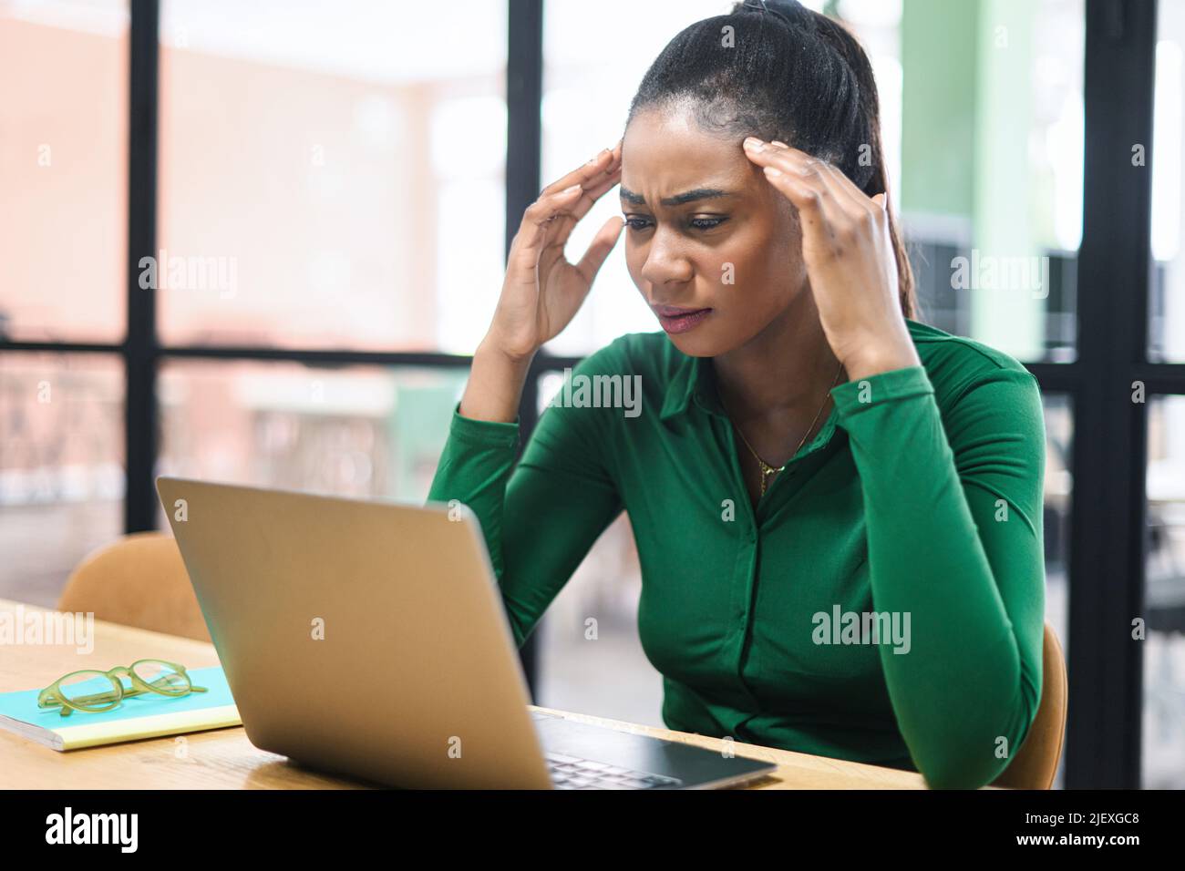 Woman staring distance office hi-res stock photography and images - Alamy