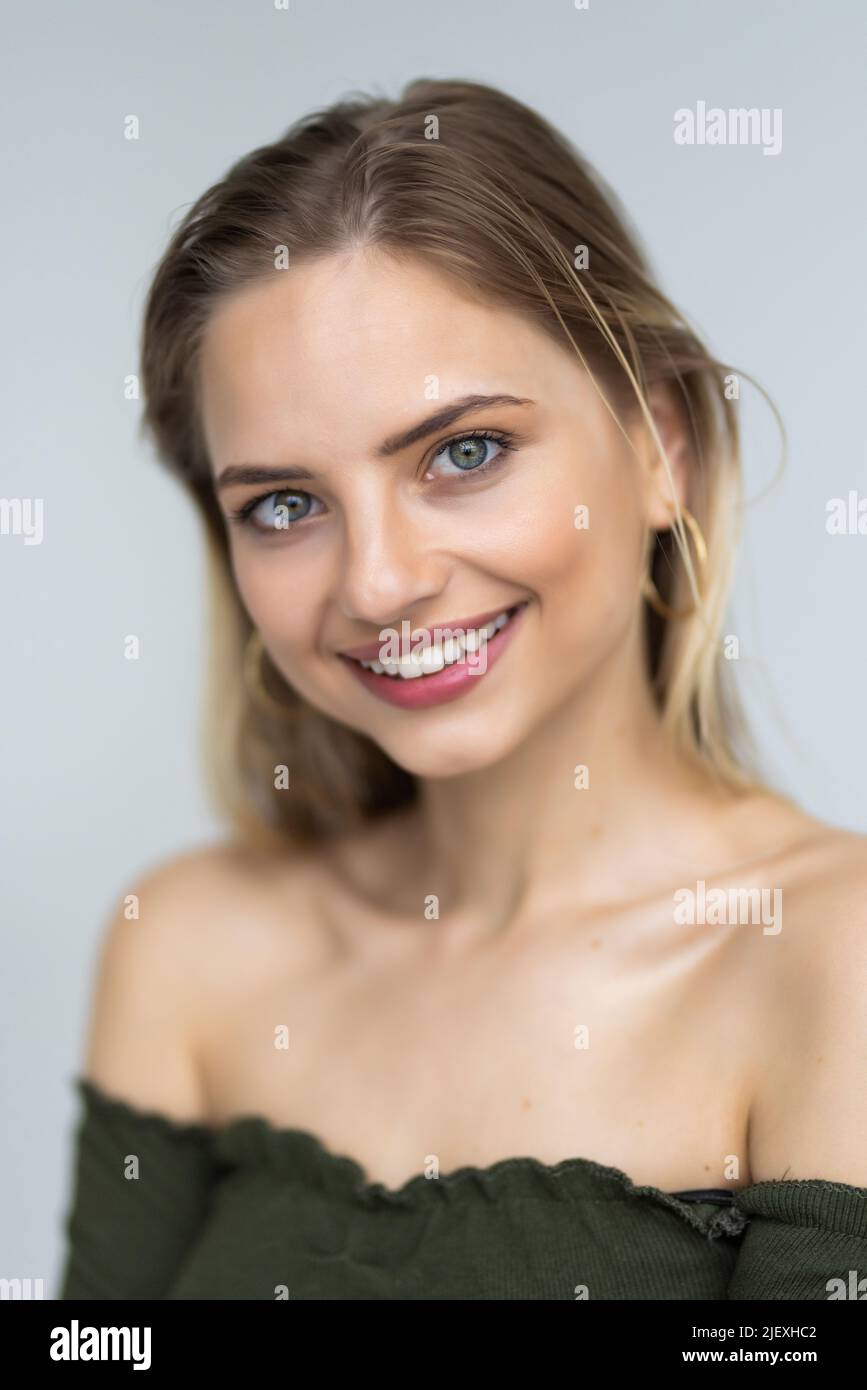 Portrait of emotive good-looking caucasian woman laughing while looking ...