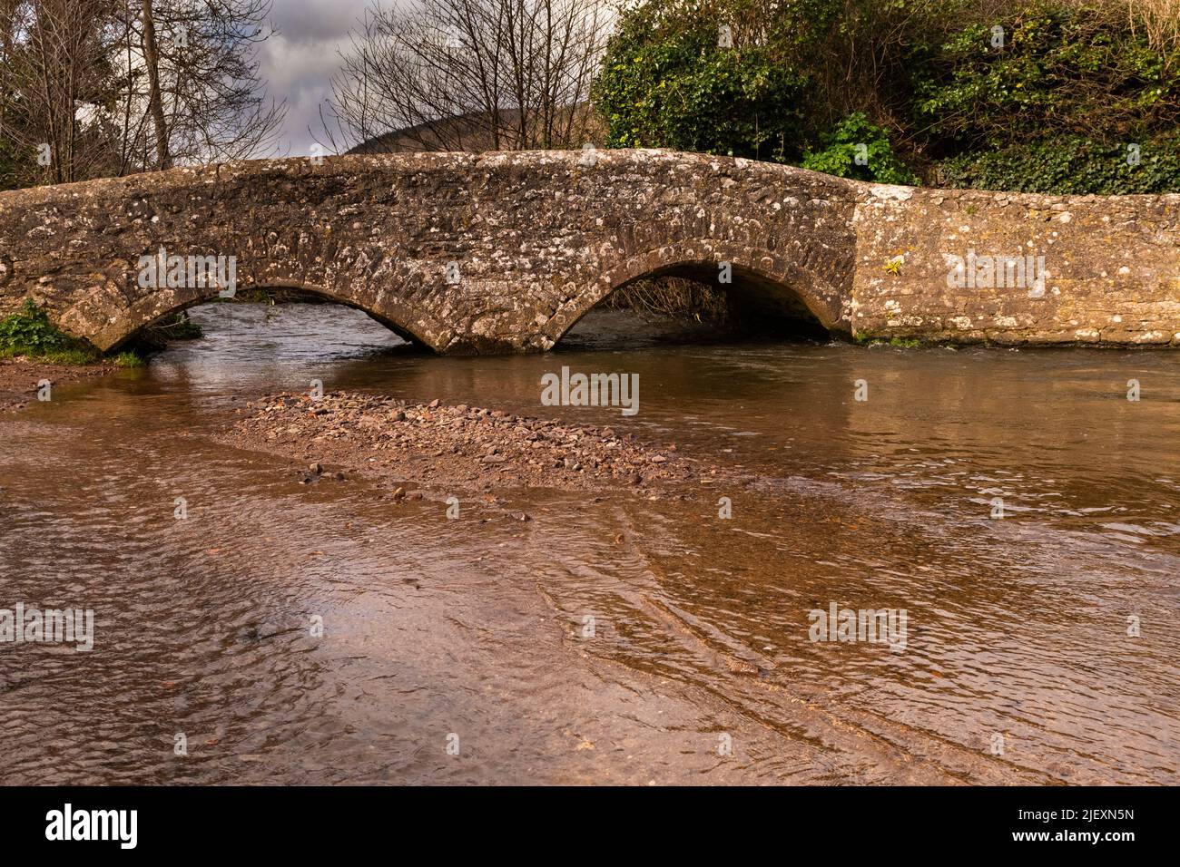 bridge at dunster Stock Photo - Alamy