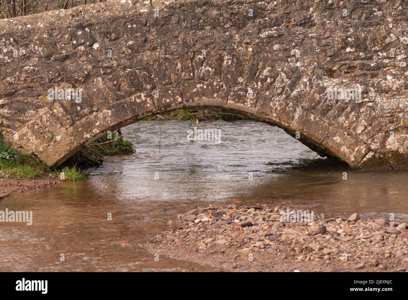 bridge at dunster Stock Photo - Alamy