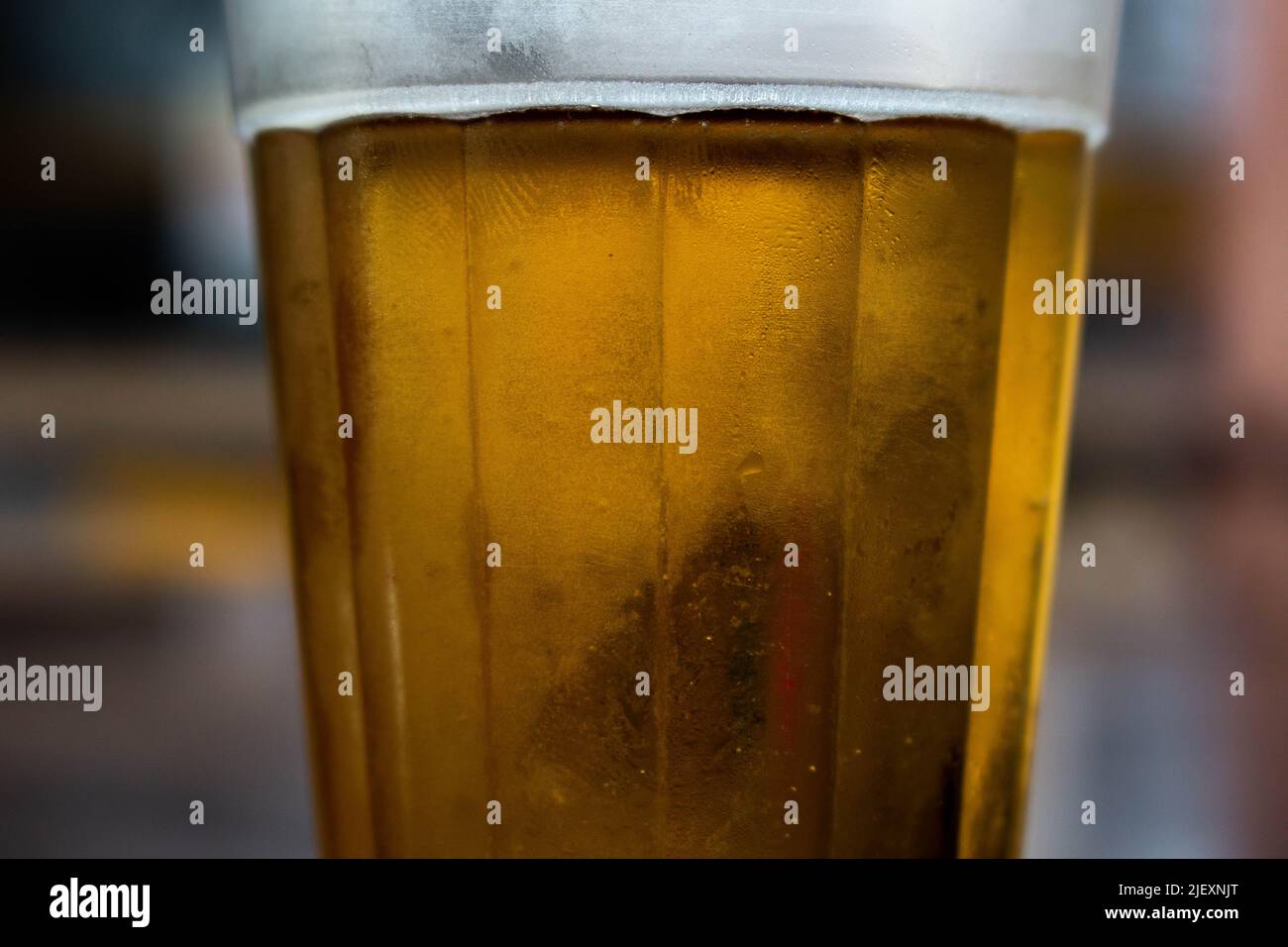 Close-up of small glass of Brazilian beer without foam Stock Photo - Alamy