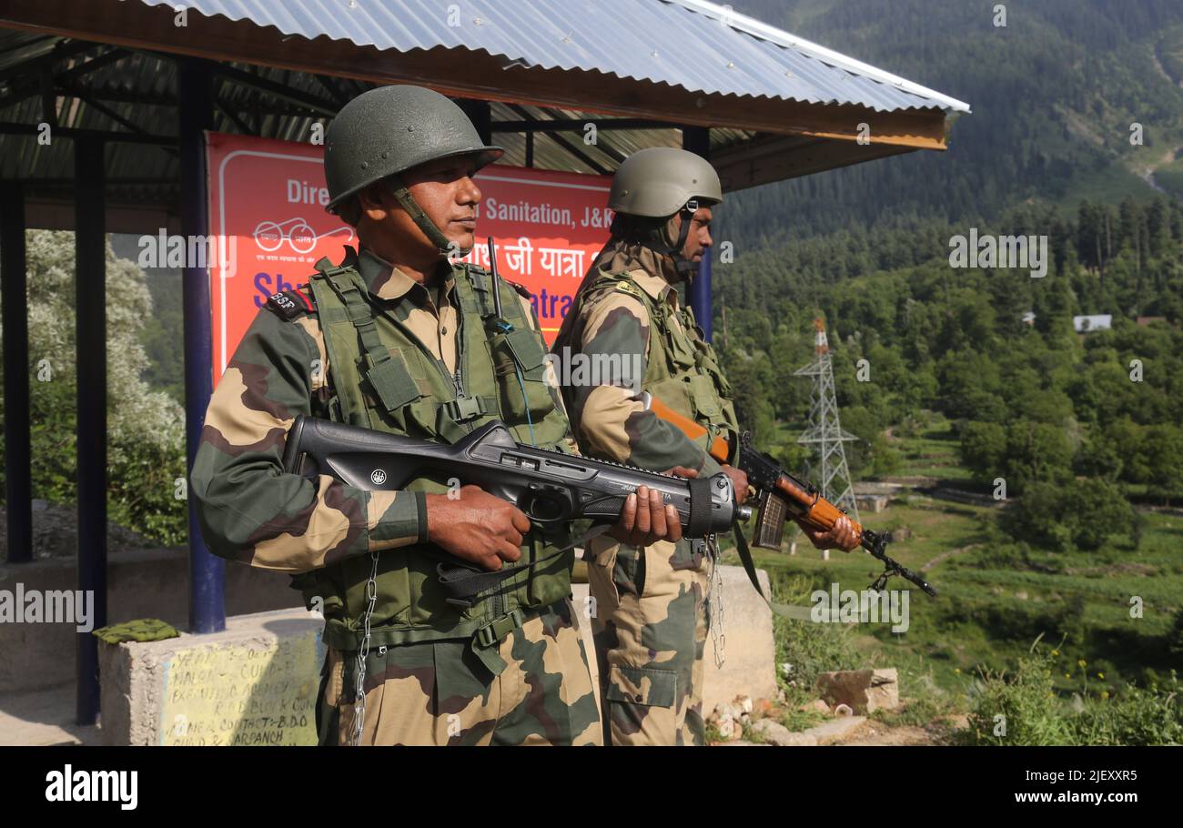 Indian Border Security Force (BSF) soldier stands alert at Baltal in ...
