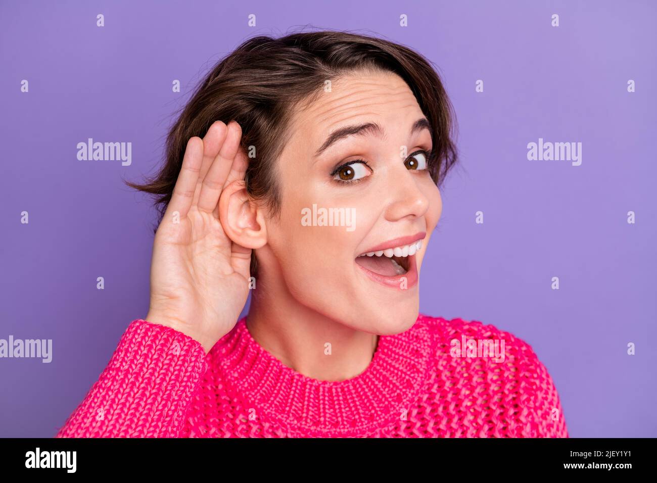 Photo of young excited girl happy positive hands near ear listen news ...