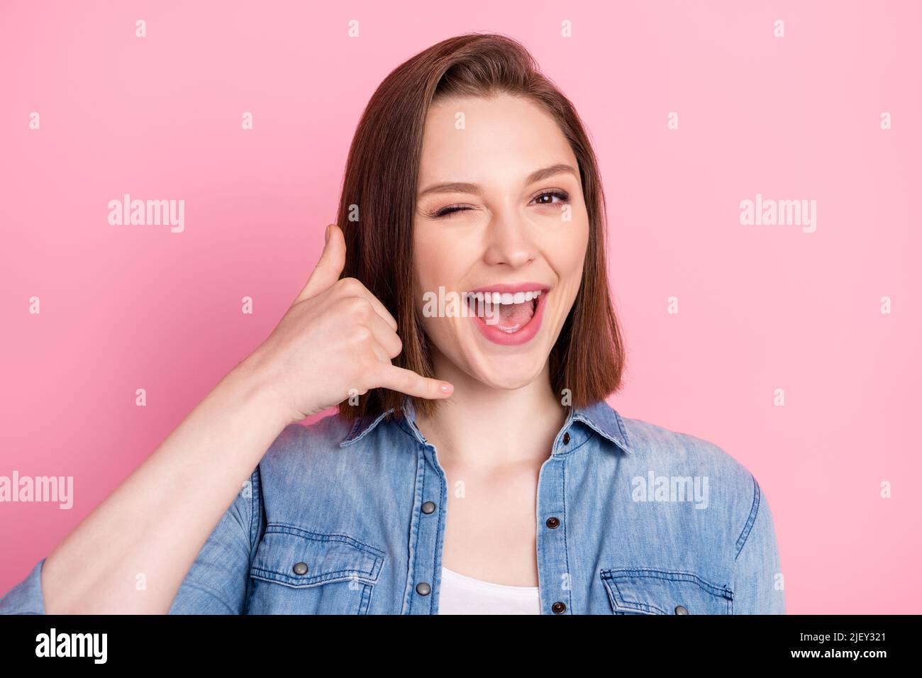 Photo portrait of girl smiling asking to call her winking blinking ...