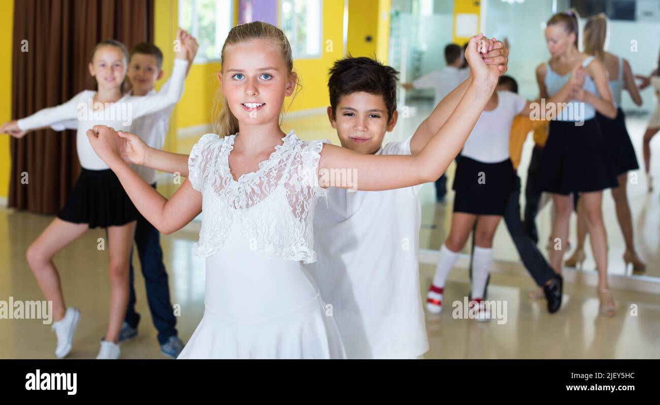 Group of children dancing tango in dance studio Stock Photo - Alamy