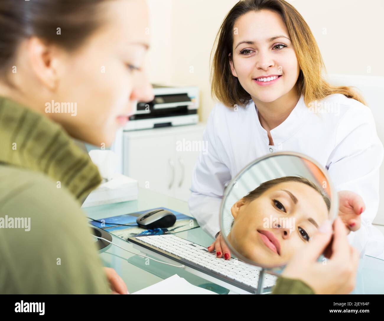 Consultation in aesthetic medicine center Stock Photo - Alamy