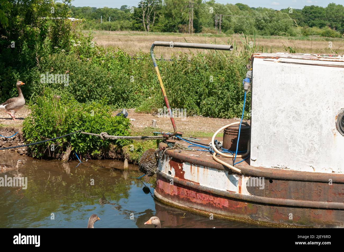 rear of old canal boat showing steering device for rudor Stock Photo ...