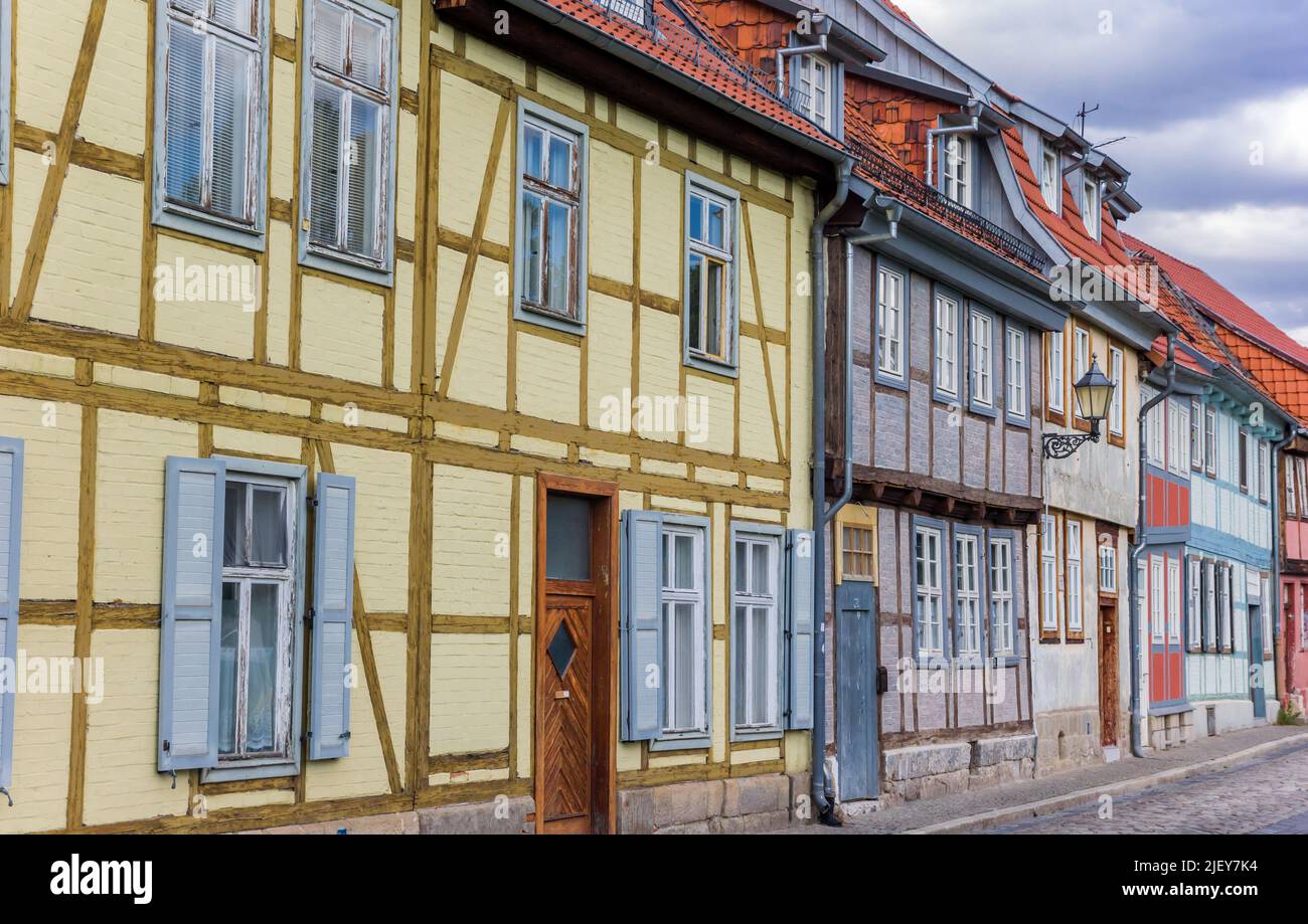 Street with colorful half timbered houses in Quedlinburg, Germany Stock ...