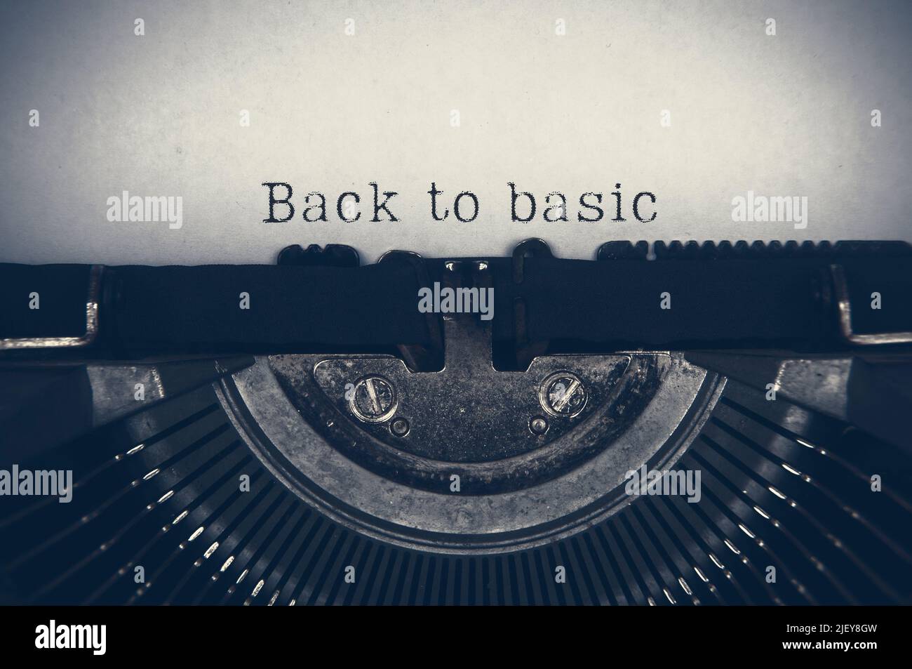 Back to basic text on an old typewriter Stock Photo - Alamy