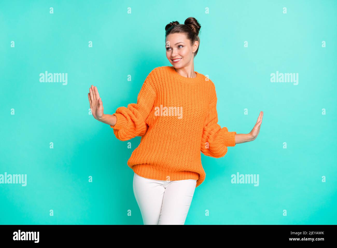 Photo portrait girl wearing knitted sweater dancing looking copyspace ...