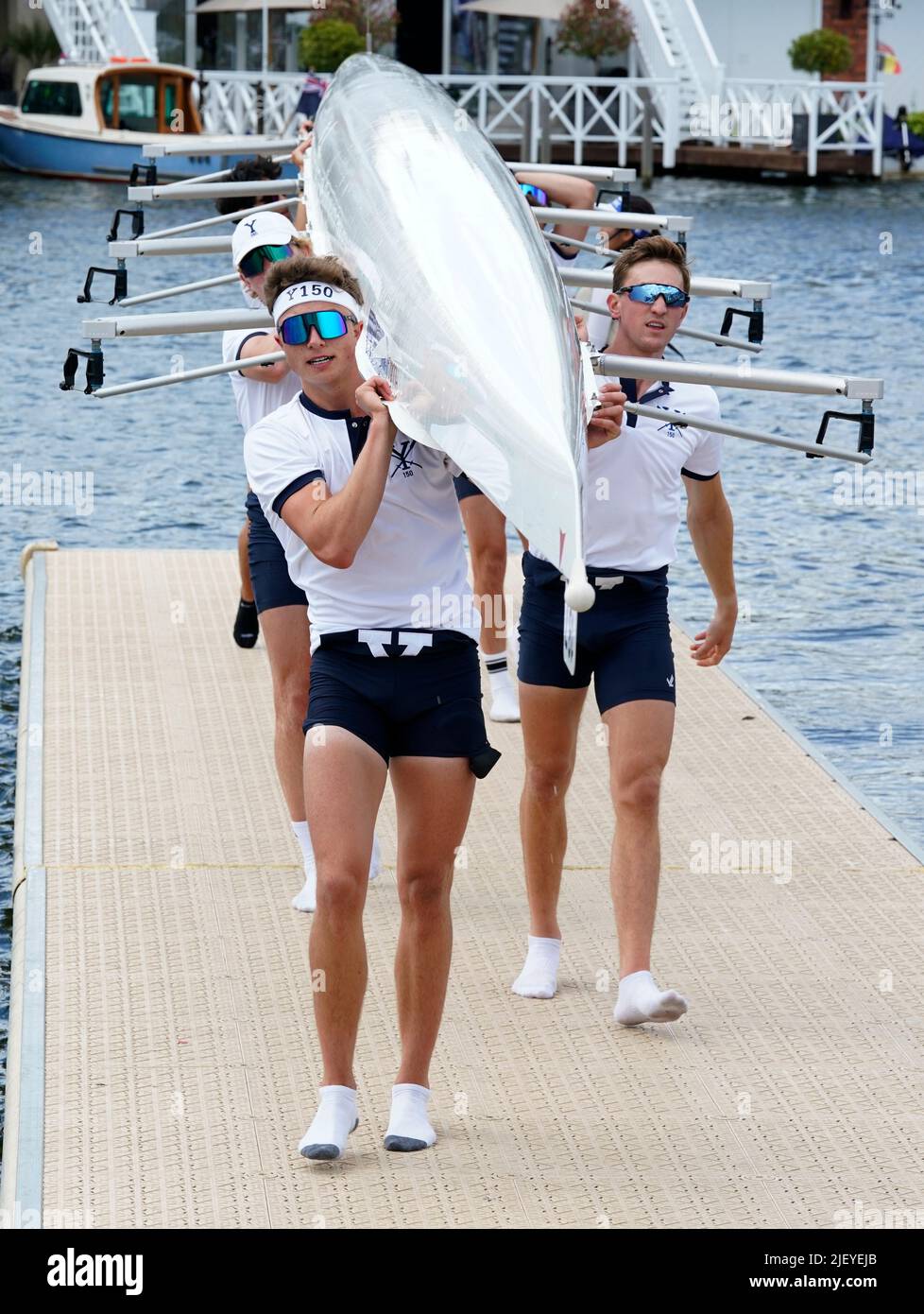 Yale University 'A' crew carry their boat back to the boat house after ...