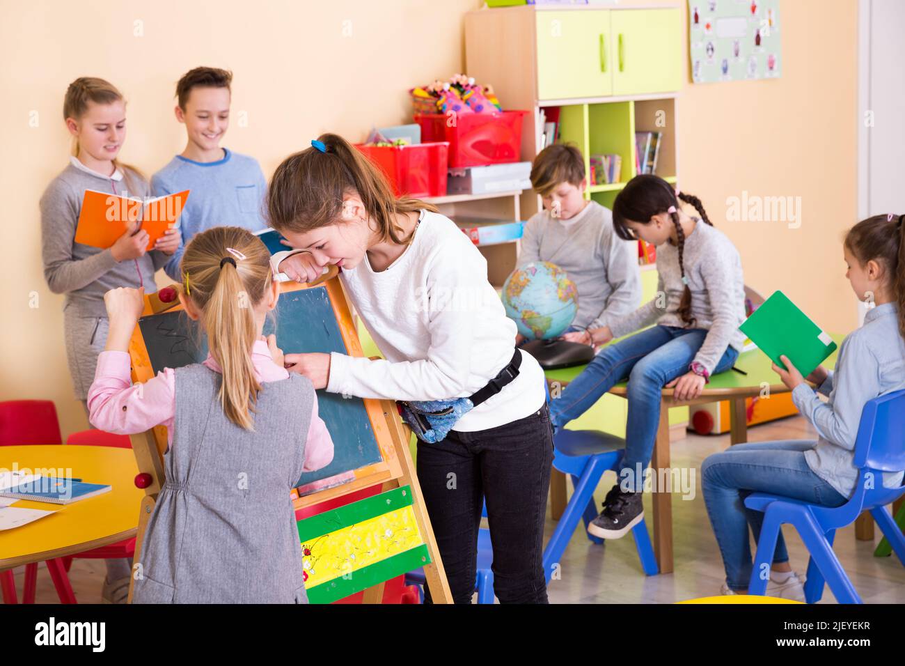 Together during recess between lessons hi-res stock photography and ...