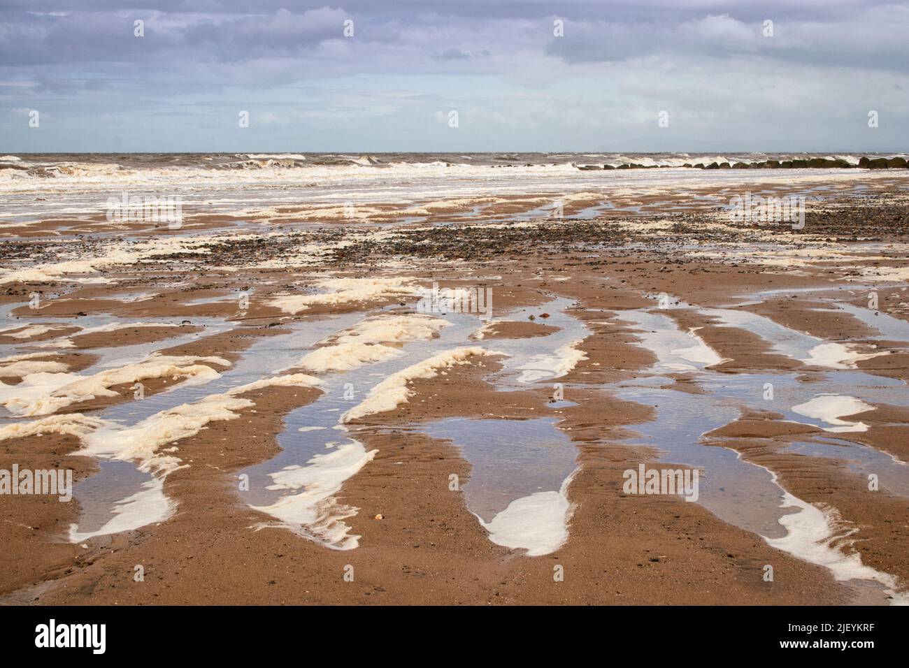 Dramatic patterns left by the ebbing tide on the beach at Cleveleeys ...