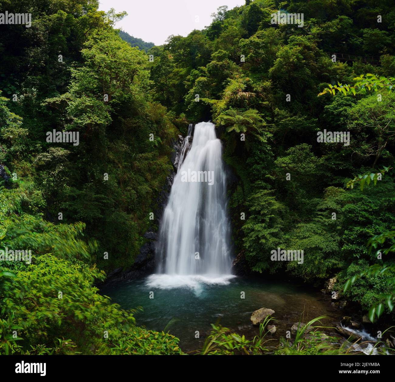 The huge waterfall strongly hit the water surface Stock Photo - Alamy