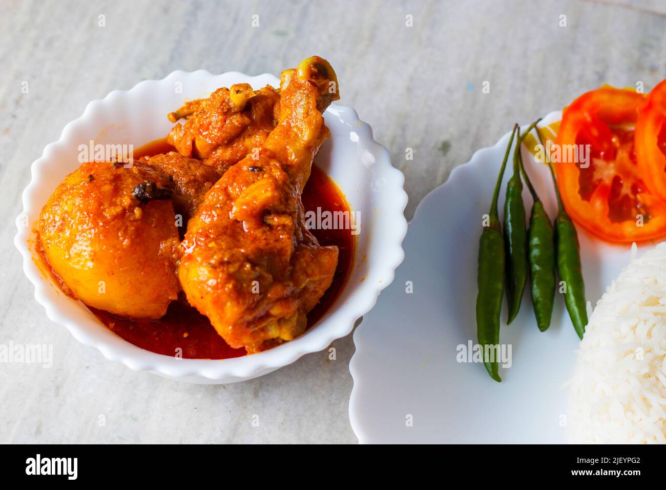 delicious Bengali style chicken curry is ready to serve Stock Photo - Alamy