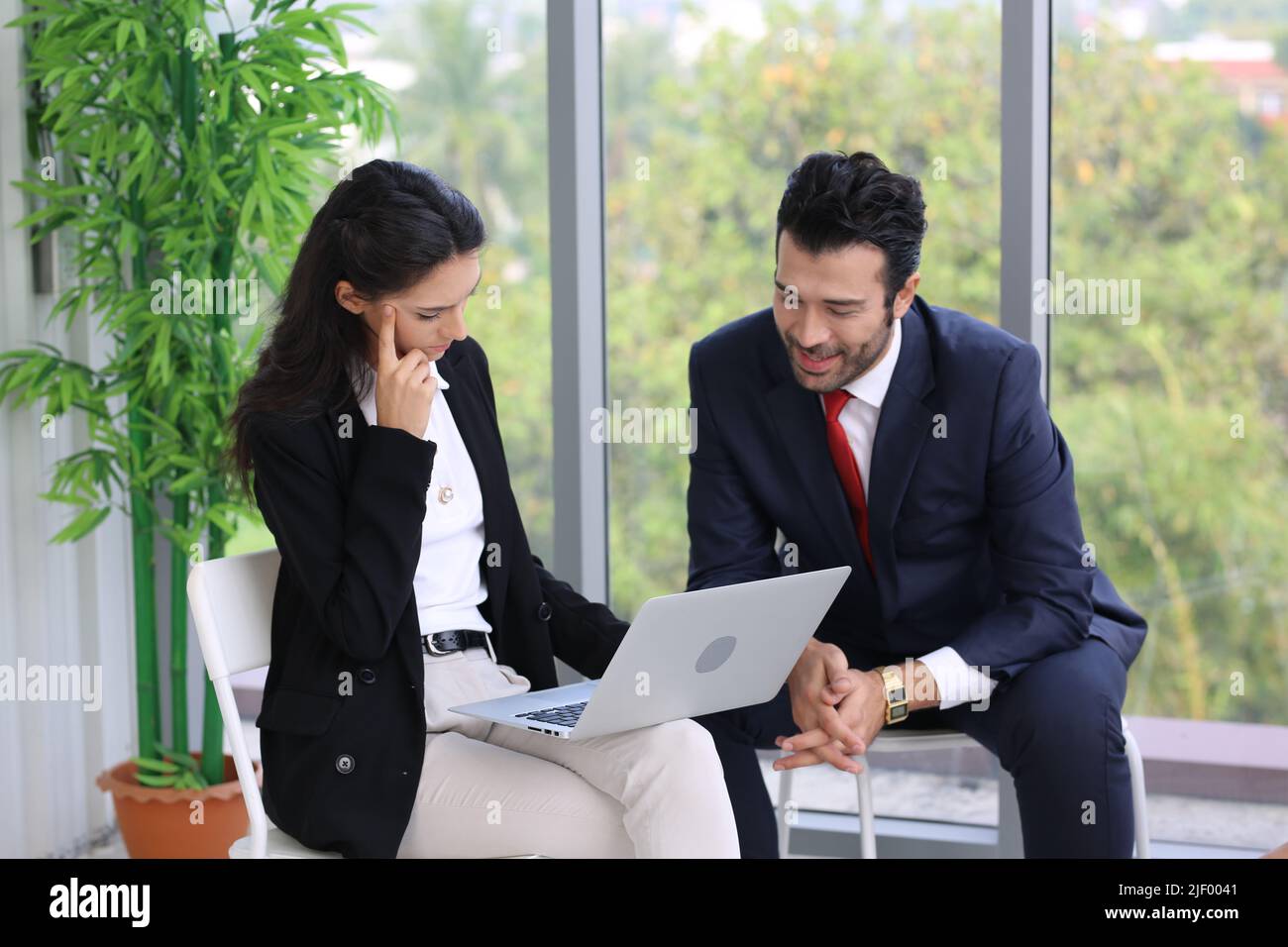 Businessman Giving Speech On Business Meeting With Colleagues ...