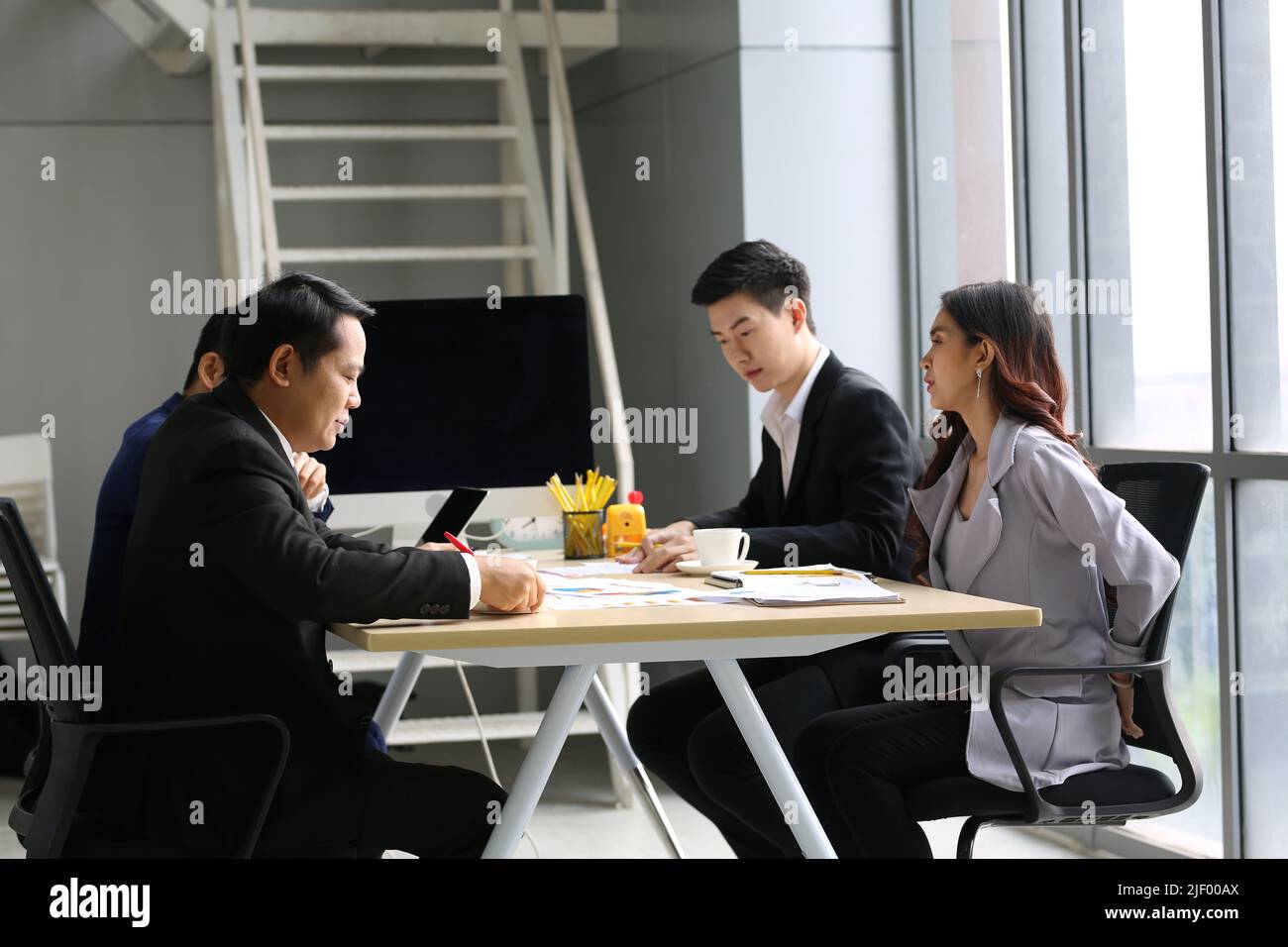 Businessman Giving Speech On Business Meeting With Colleagues ...