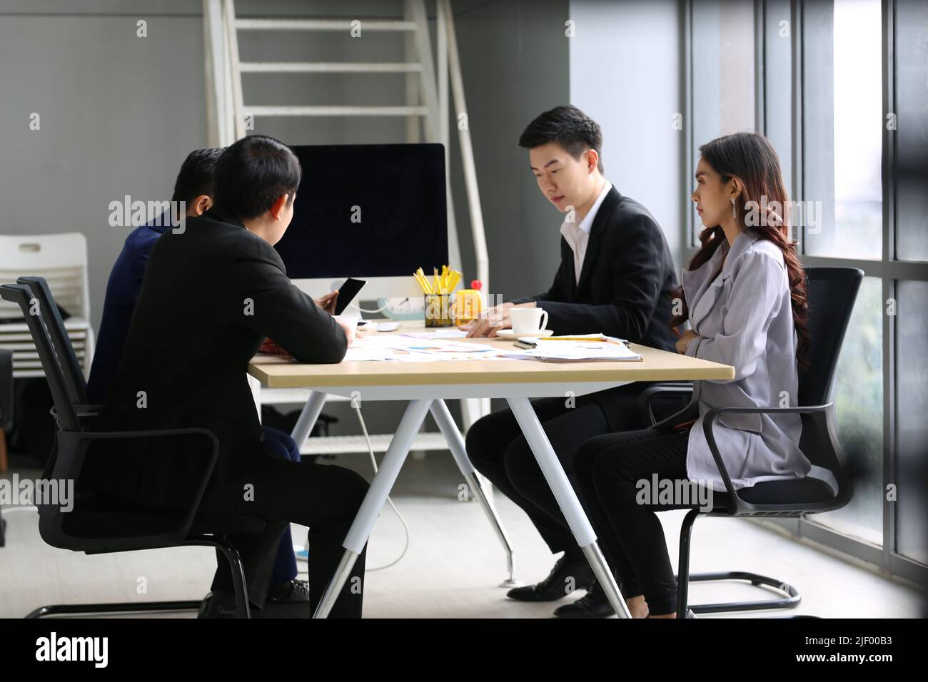 Businessman Giving Speech On Business Meeting With Colleagues ...