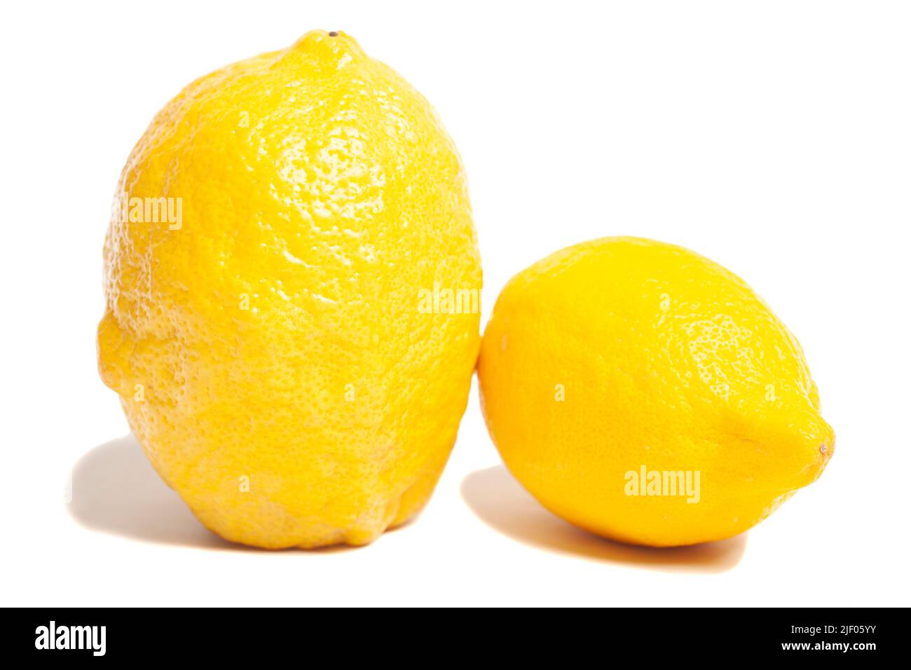Two lemons isolated on white background. Tropical fruit Stock Photo - Alamy