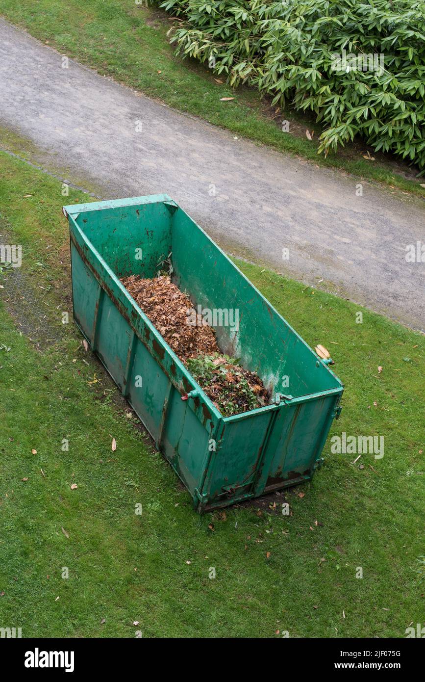 top view of a green dumpster filled with organic waste Stock Photo - Alamy